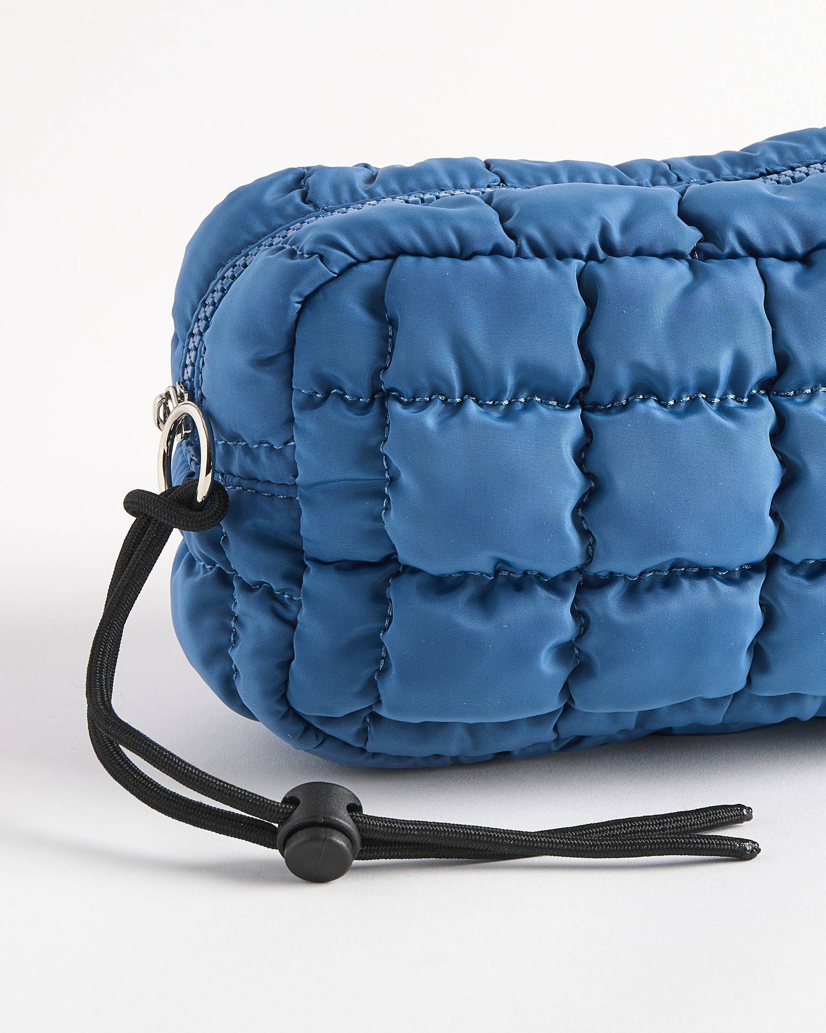 Puffer Pouch with Wristlet Strap in Blue | Uncharted Threads | The ...