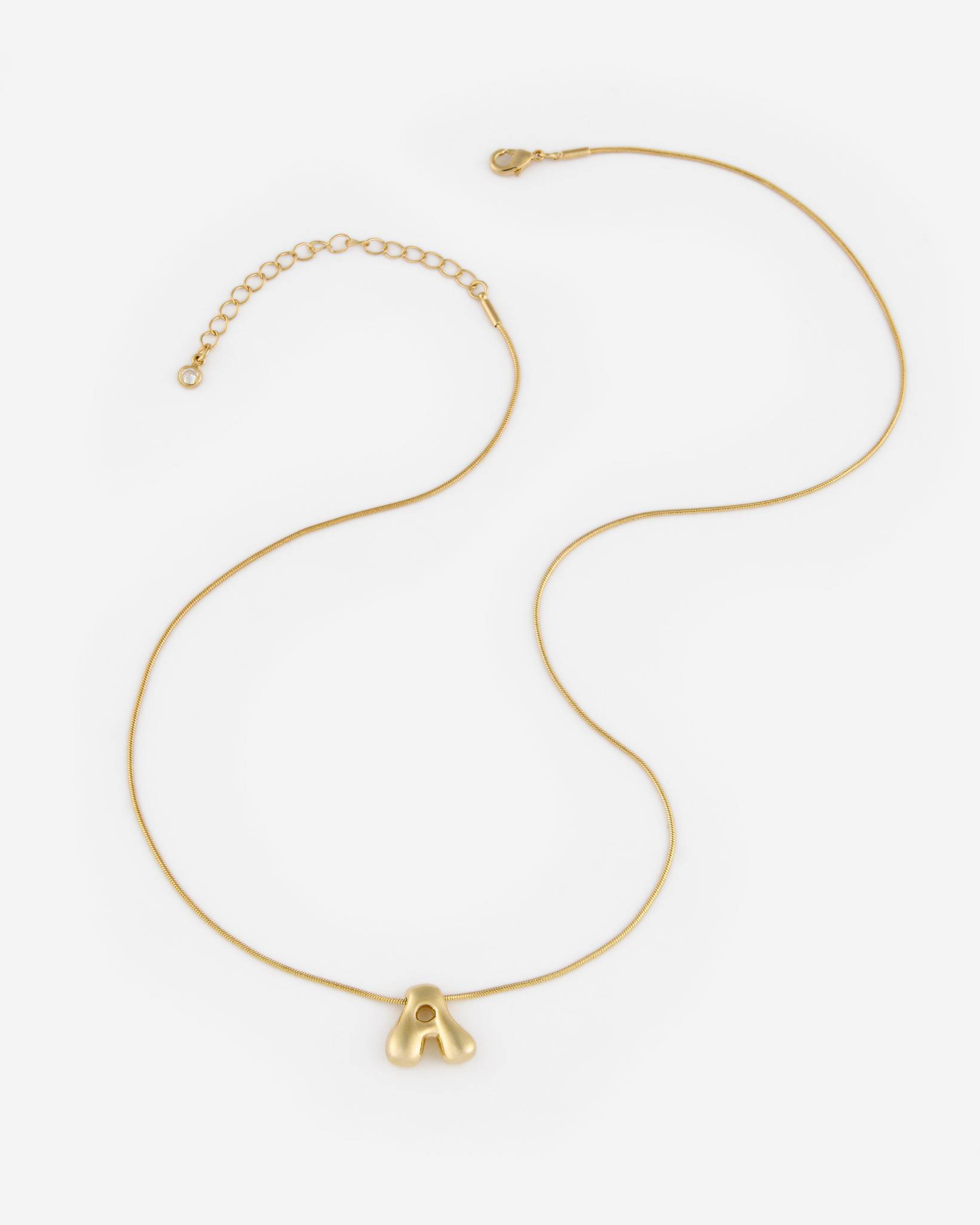 A Bubble Initial Pendant Necklace in Gold | Uncharted Threads | The ...
