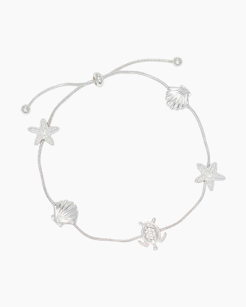 Sea Life Charm Bolo Bracelet in Gold | Periwinkle by Barlow | The Paper ...